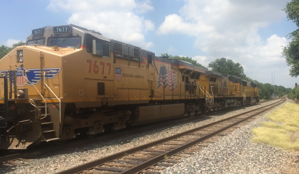 UP 7677 14Jun2016 3d of 3 NB out of BERGSTROM with general merchandise
